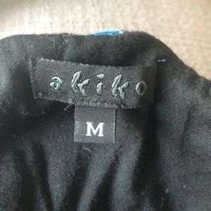 Akiko | Tops | Neimans Black Tank With Blue 0 Leather Straps | Poshmark